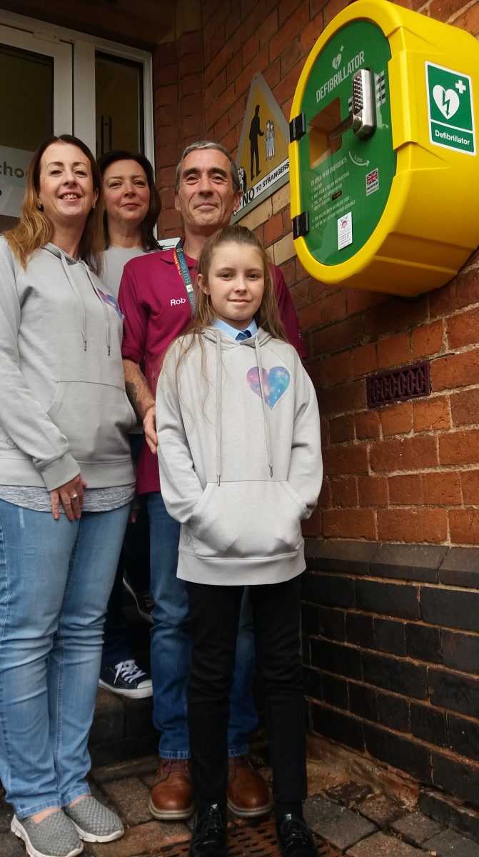 Bromsgrove's Emily gives her second defib to Dodford First School as ...